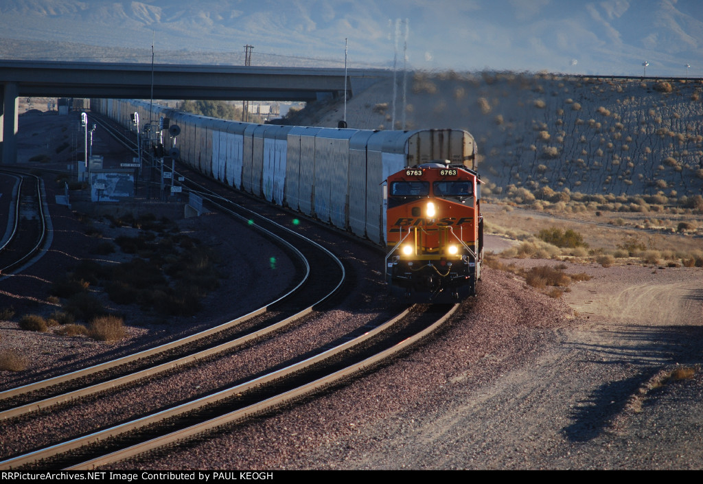 BNSF 6763 Leads a Loaded Vehicle Train West out off the BNSF Barstow Yard.